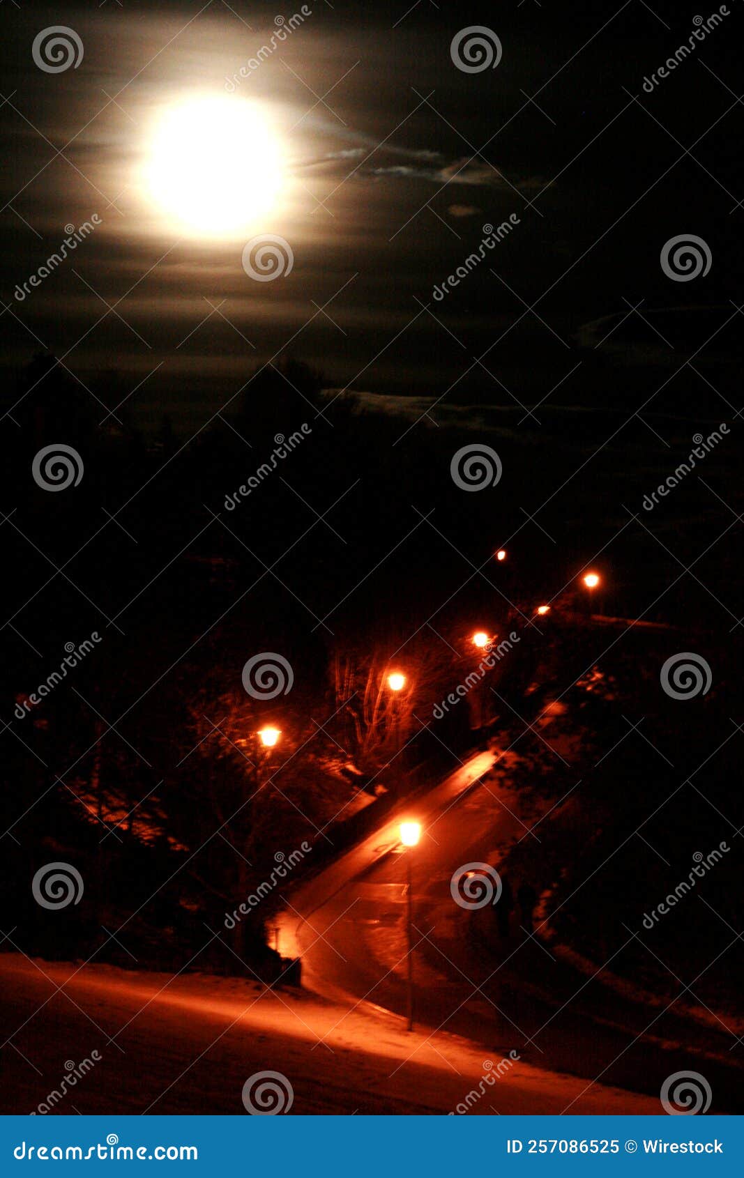 Vertical Shot of Moon Over a Street at Night Stock Image - Image of ...