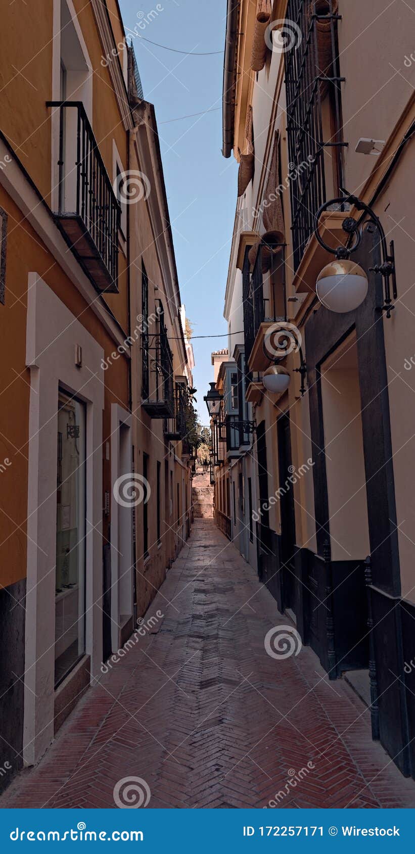 Vertical Shot of a Narrow Passageway between Two Buildings Stock Image ...