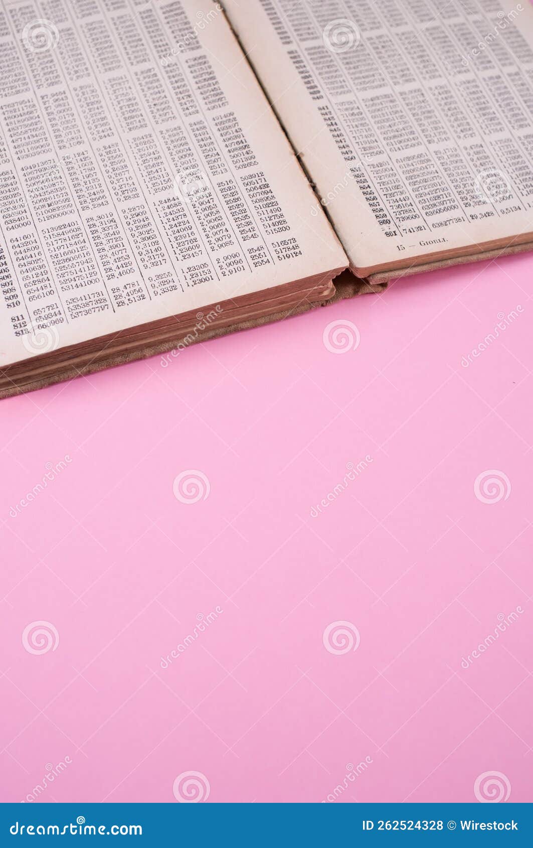 Vertical Shot of an Old Book with Formulas on a Pink Surface Editorial ...