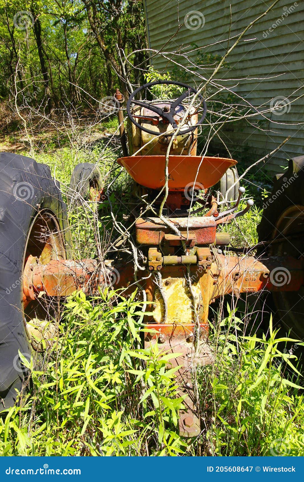 Vertical Shot of an Old, Broken Down Tractor in the Yard Stock Image ...