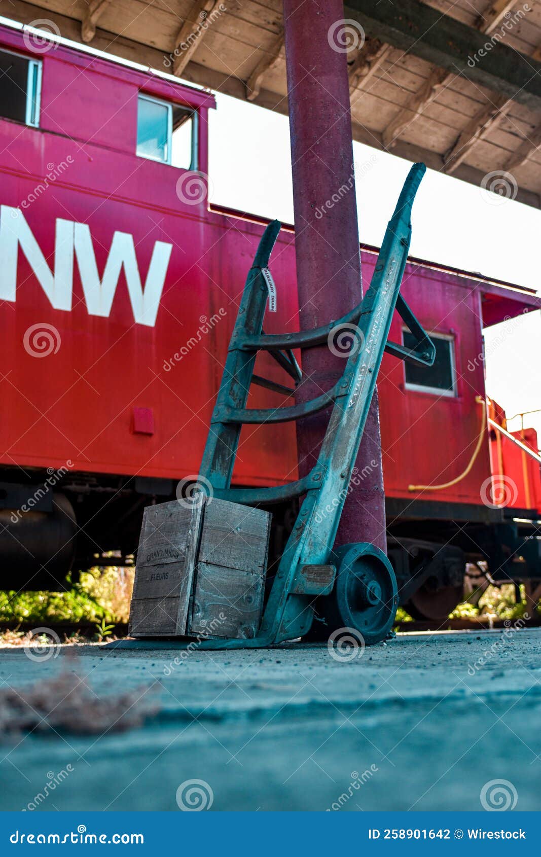 Vertical Shot of an Old Cart at the Train Station. Stock Photo - Image ...