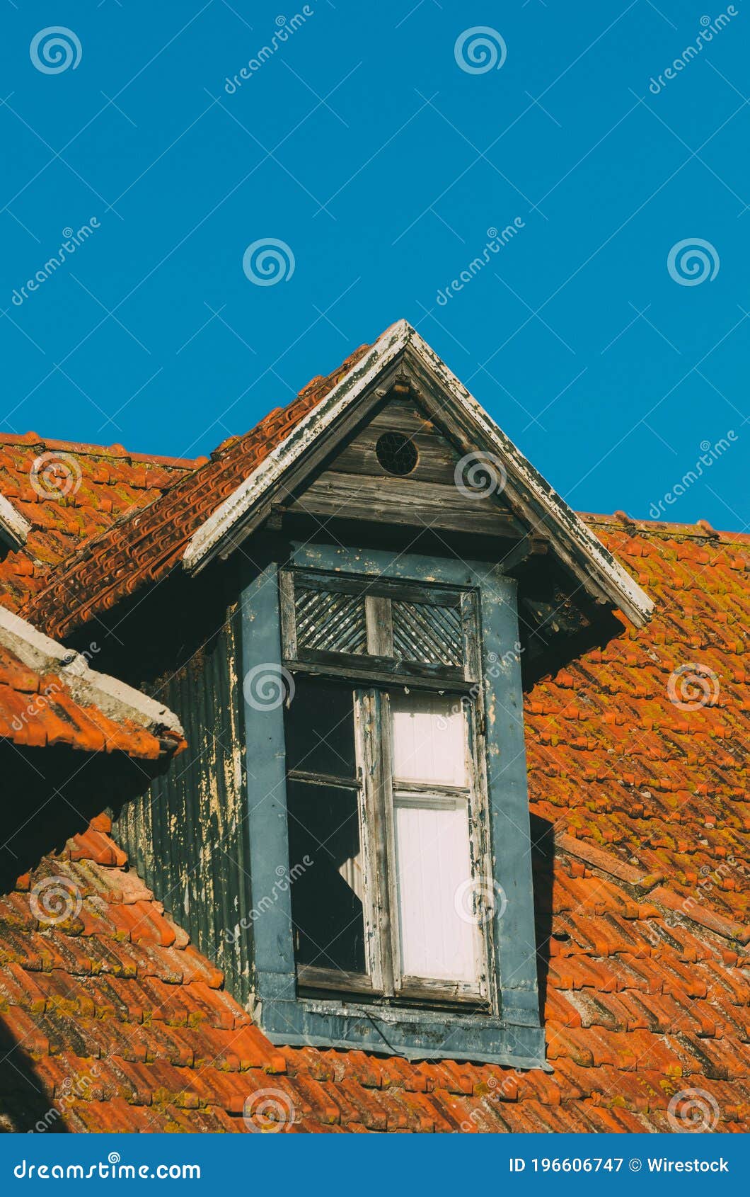 Vertical Shot of an Old Dormer on the Roof of a Building Stock Image ...