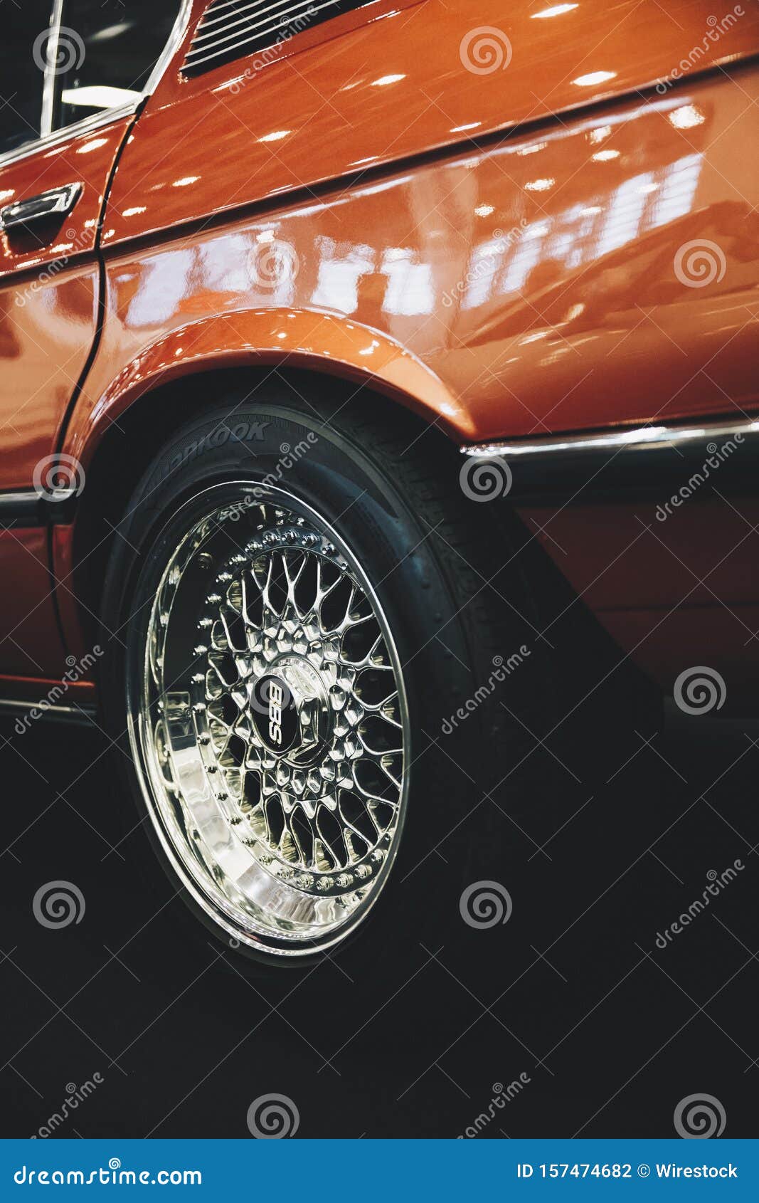 Vertical Shot of an Old Red Car with Shiny Rims Stock Photo - Image of ...