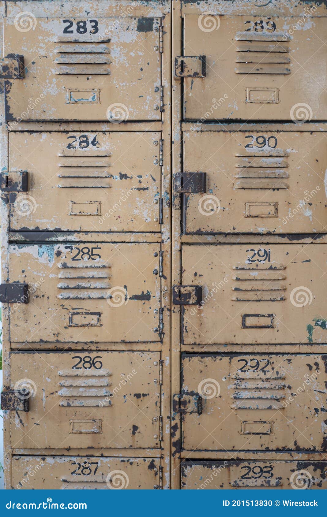 Vertical Shot of Old Rusty Numbered Metal Lockers Stock Photo - Image ...
