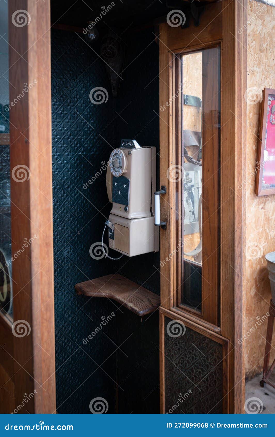 A Vertical Shot of an Old Vintage Telephone on the Wall Editorial Stock ...
