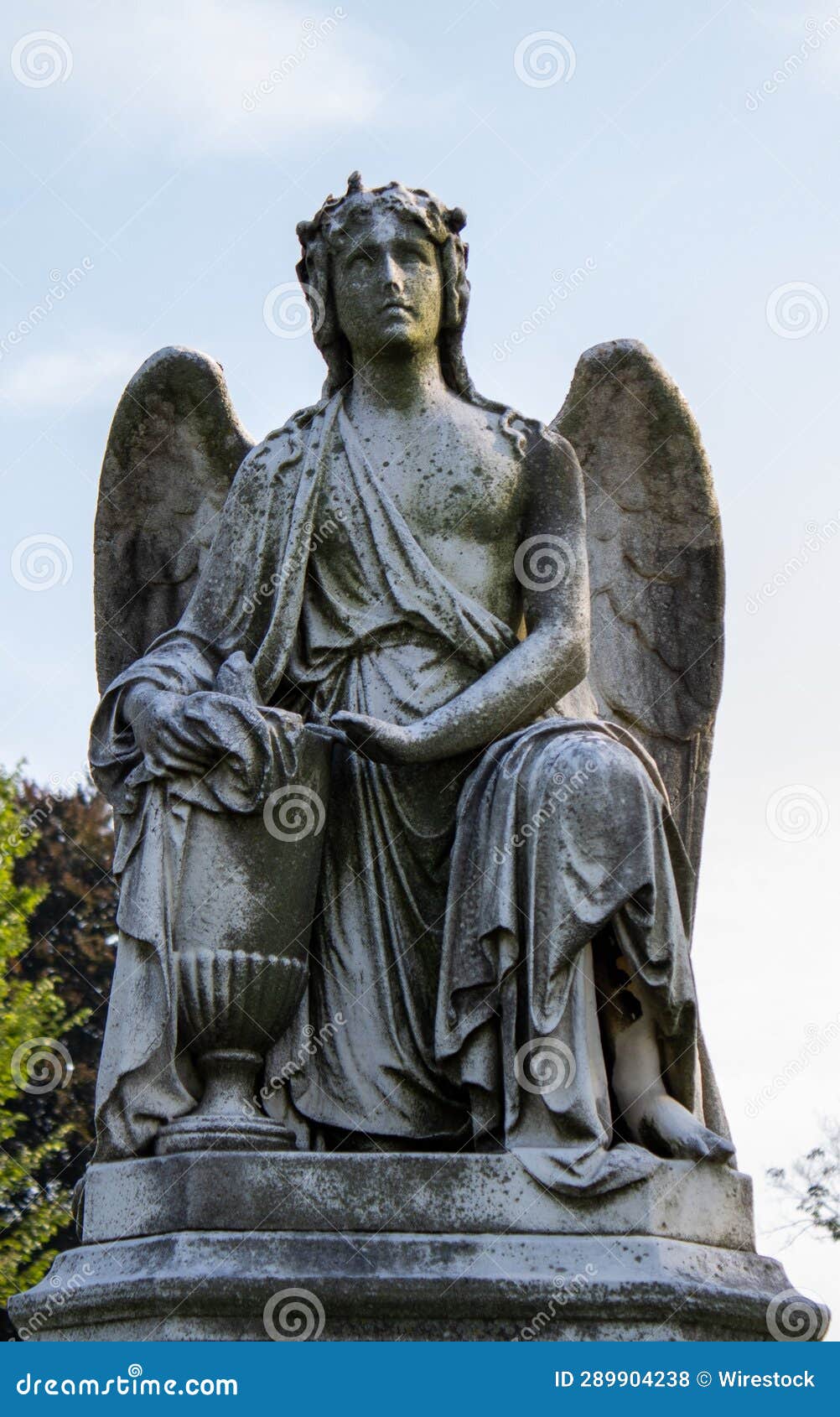 Vertical Shot of an Old Weathered Angel Statue in a Graveyard Editorial ...