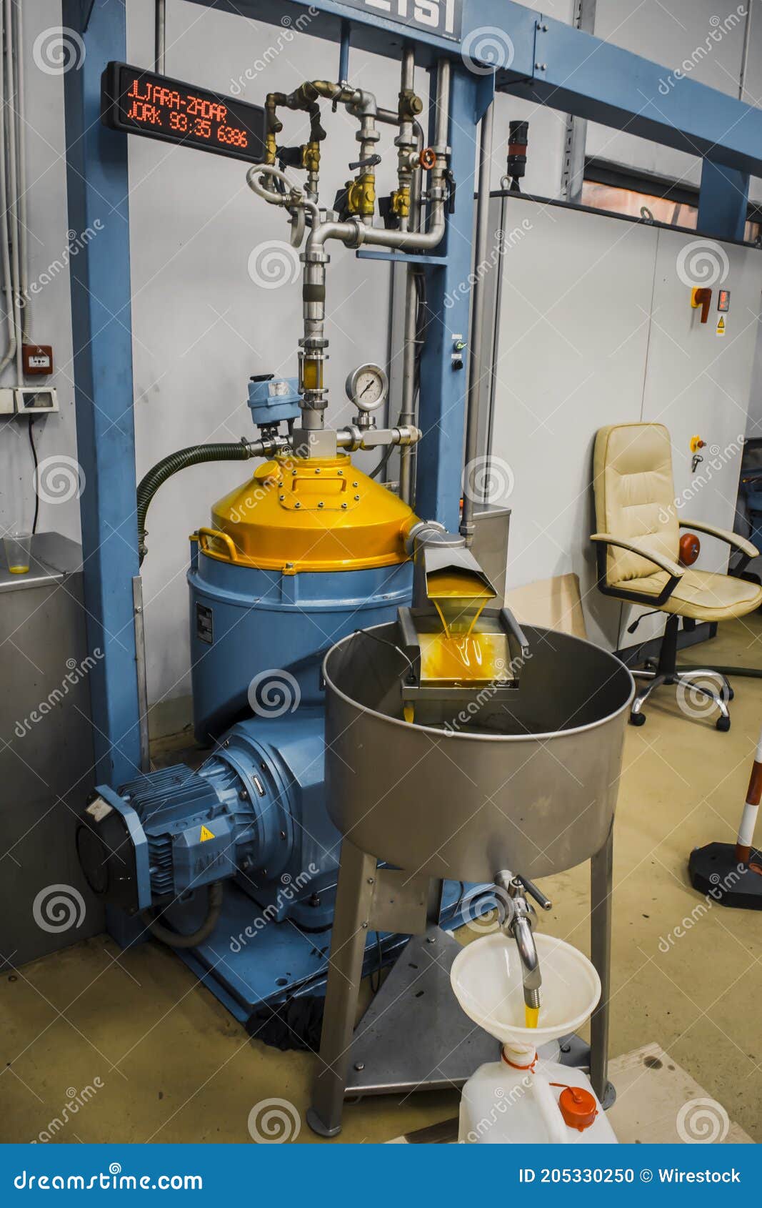 Vertical Shot of the Olive Oil Extraction Process through Modern ...