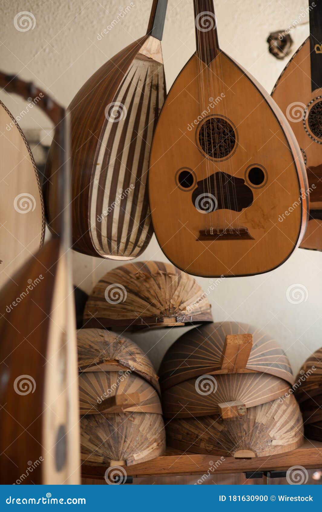 Vertical Shot of Oud Musical Instruments Hanging on the Wall Stock ...