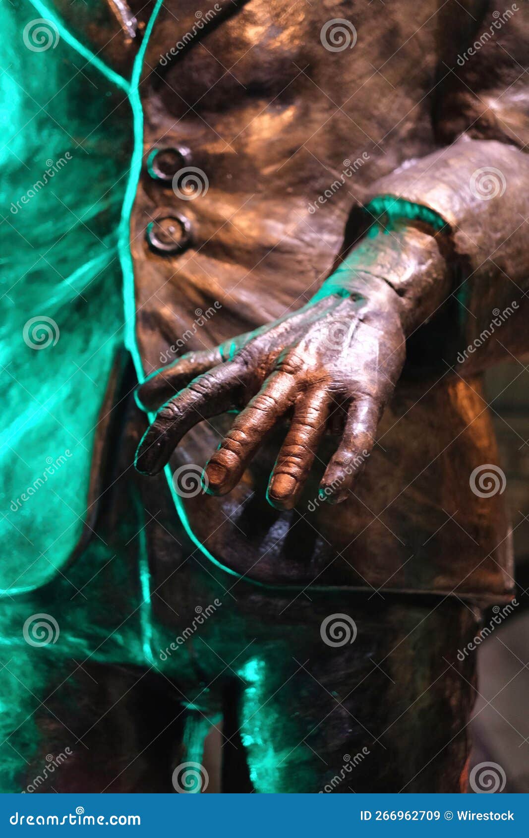 Vertical Shot of the Outstretched Hand of a Statue and the Reflection ...