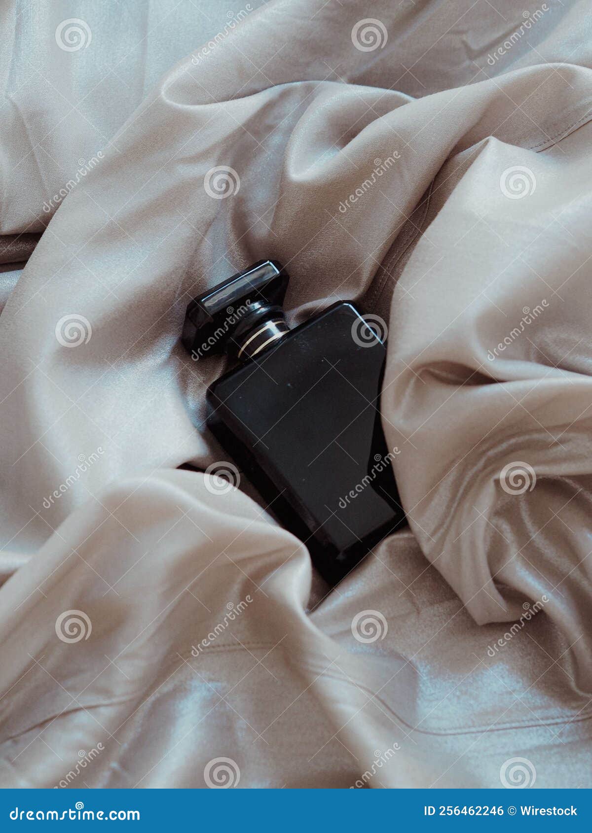 Vertical Shot of a Perfume Bottle on Silk Stock Photo - Image of luxury ...