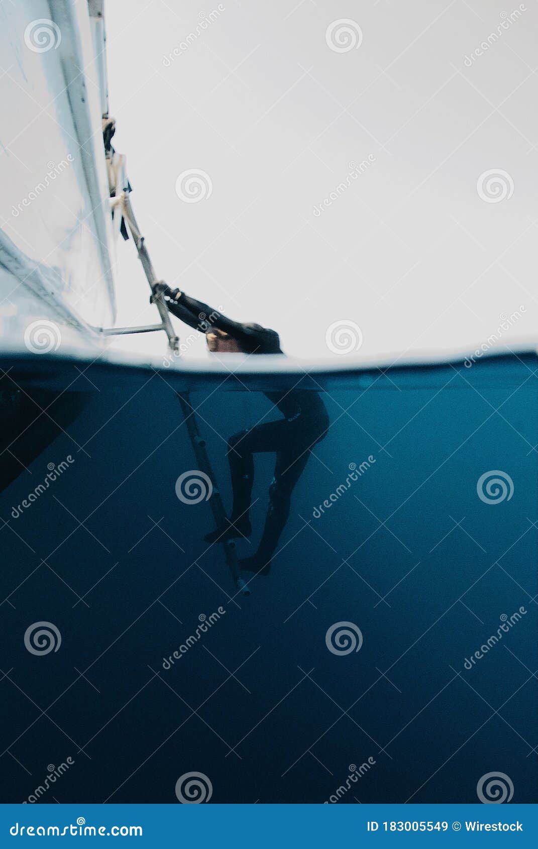 Vertical Shot of a Person Going Down the Steps Ready To Start Diving ...