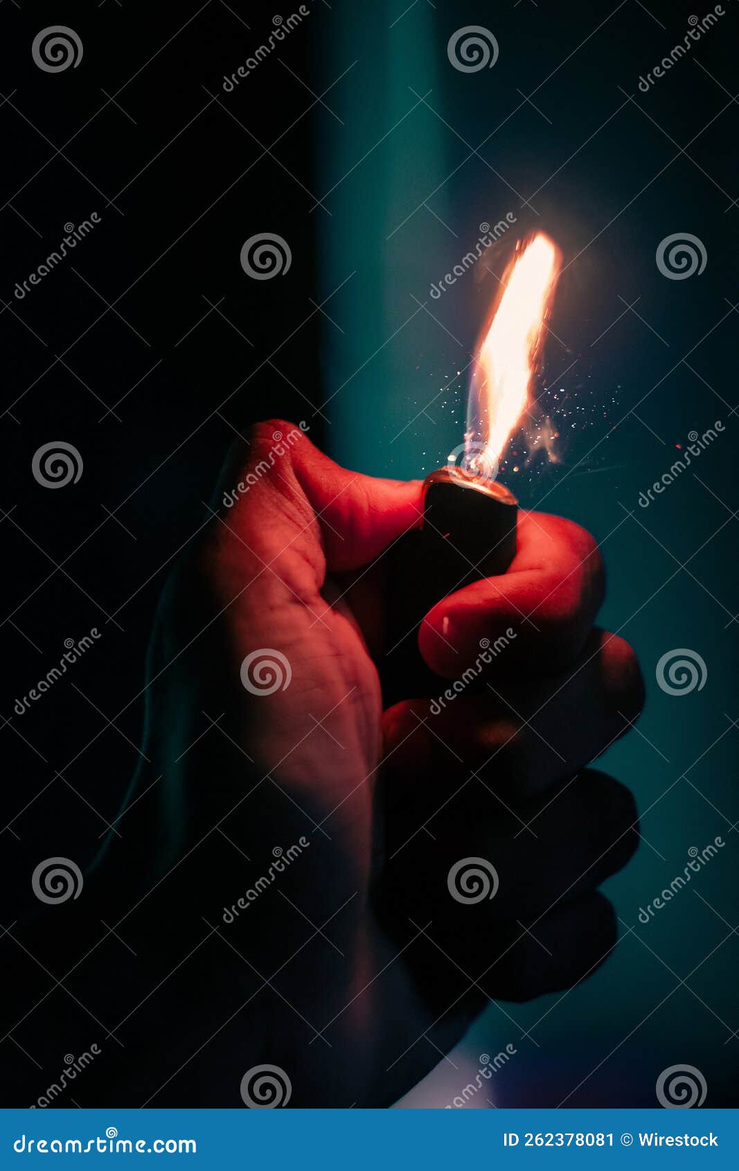 Vertical Shot of a Person Hand Holding a Lit Lighter Stock Image ...