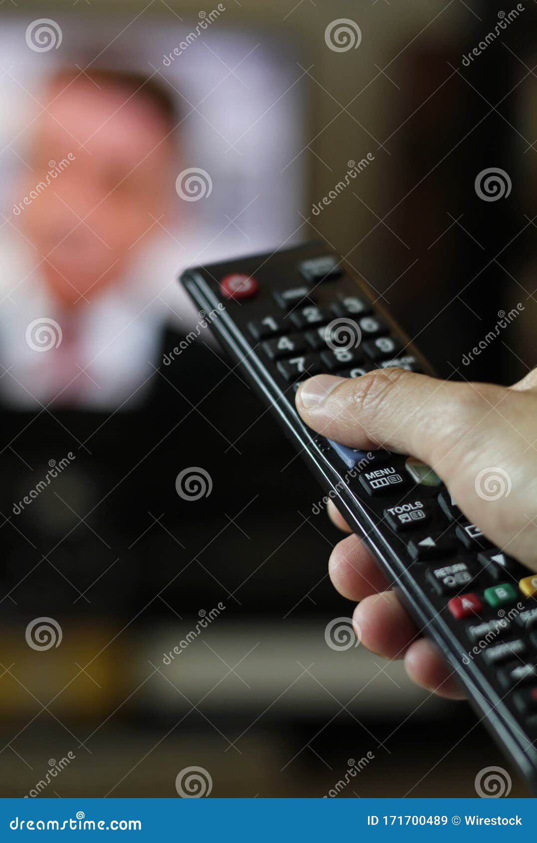 Vertical Shot of a Person Using the Television Remote Stock Image ...