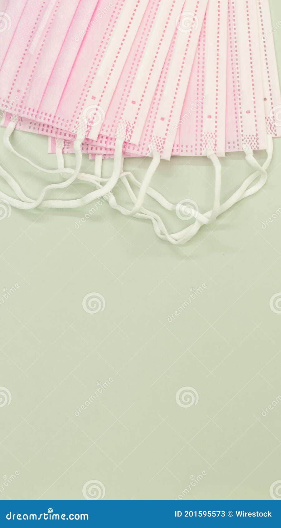 Vertical Shot of Pink Surgical Masks on a White Surface Stock Image ...