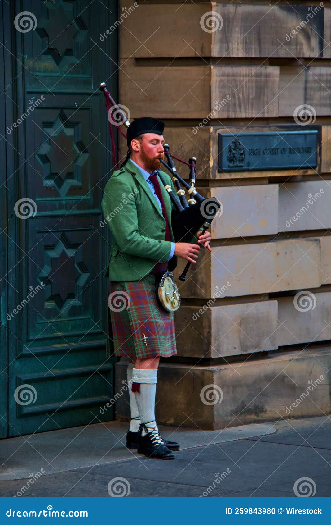 Vertical Shot of the Piper Playing in Edinburgh Editorial Image - Image ...