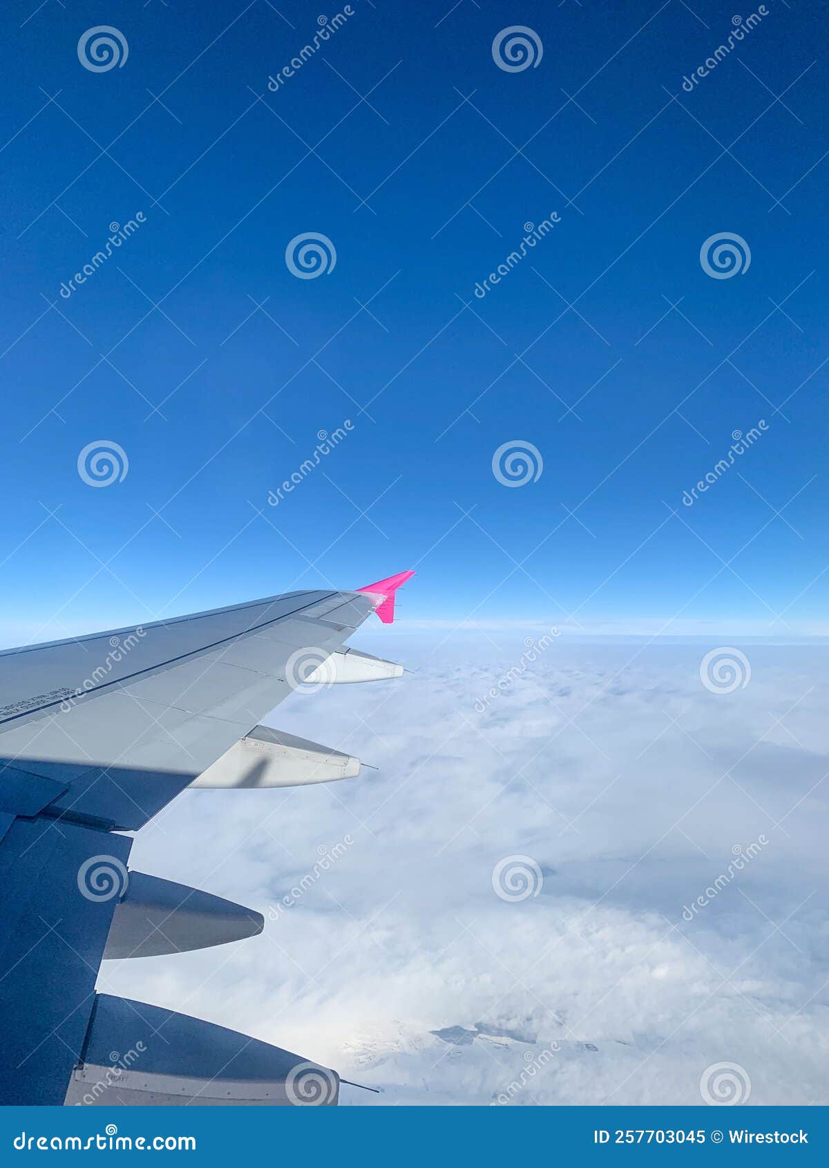 Vertical Shot of a Plane Wing High Above the Sky Stock Image - Image of ...