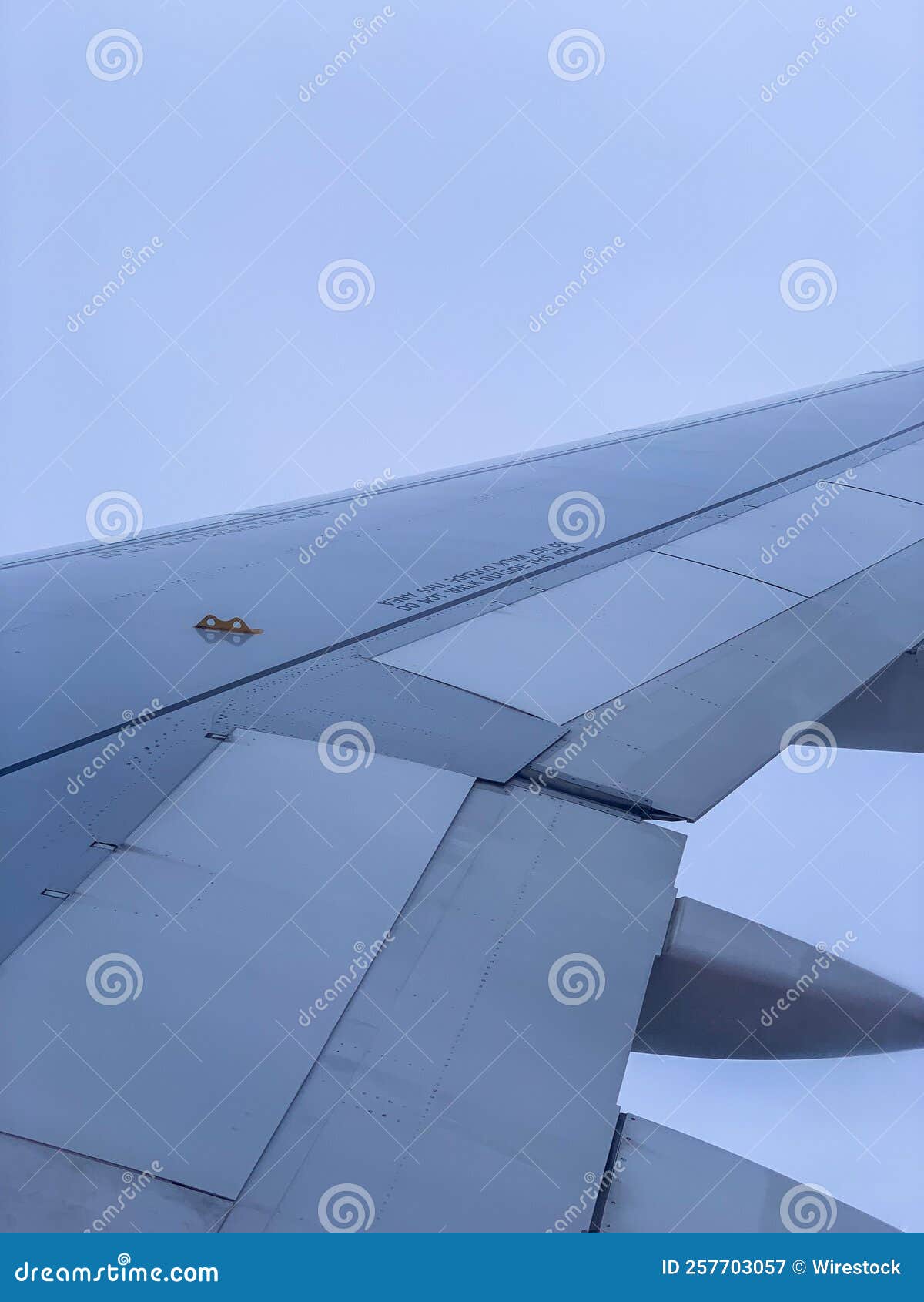 Vertical Shot of a Plane Wing High Above the Sky Stock Image - Image of ...
