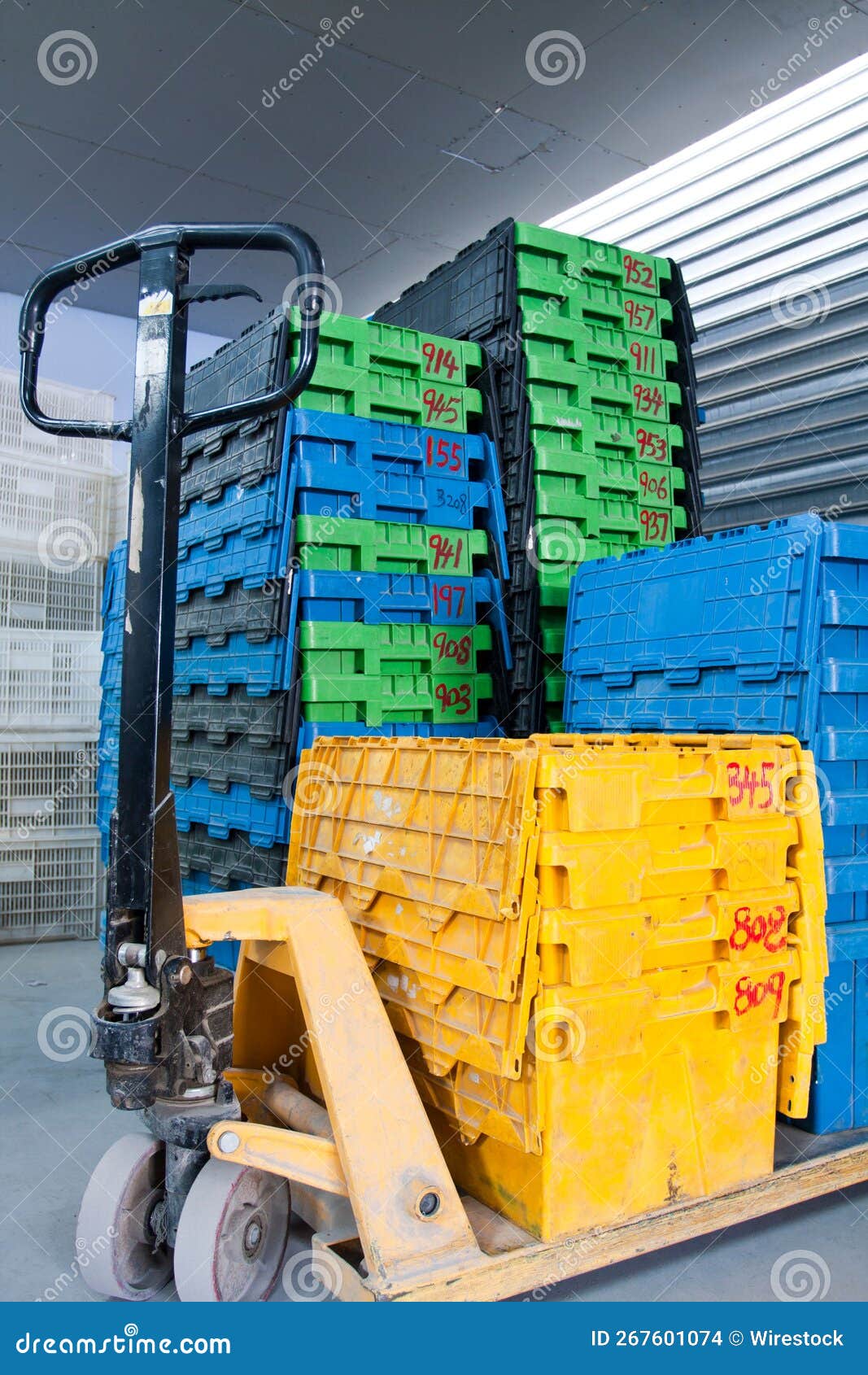 Vertical Shot of Plastic Containers in a Warehouse Stock Photo - Image ...