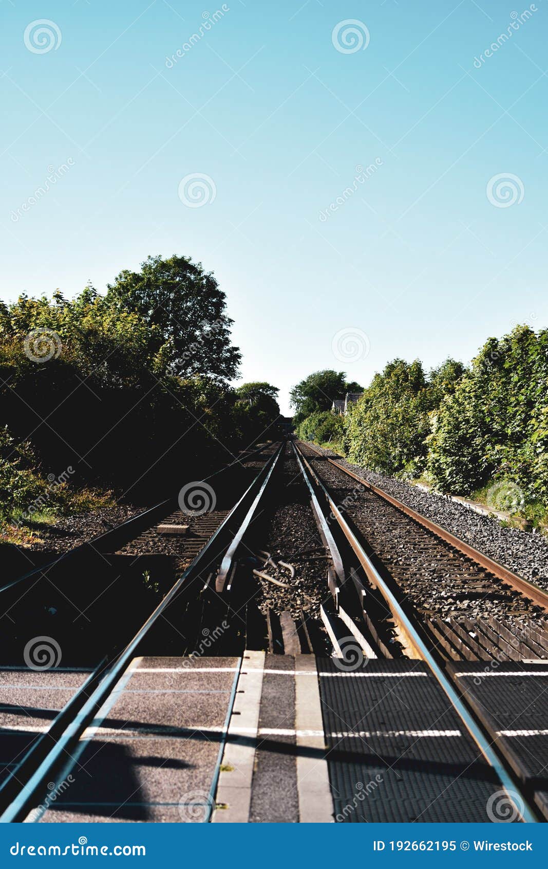 Vertical Shot of Railroad with a Clear Sky Background Stock Image ...