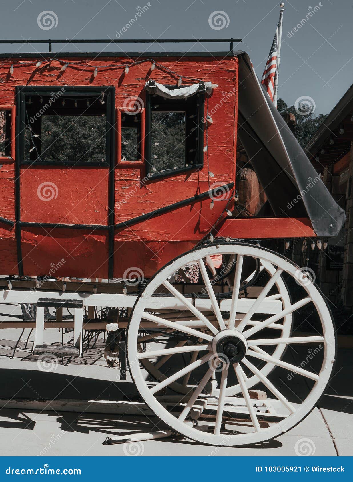 Vertical Shot of a Red Carriage Under the Sun Stock Image - Image of ...