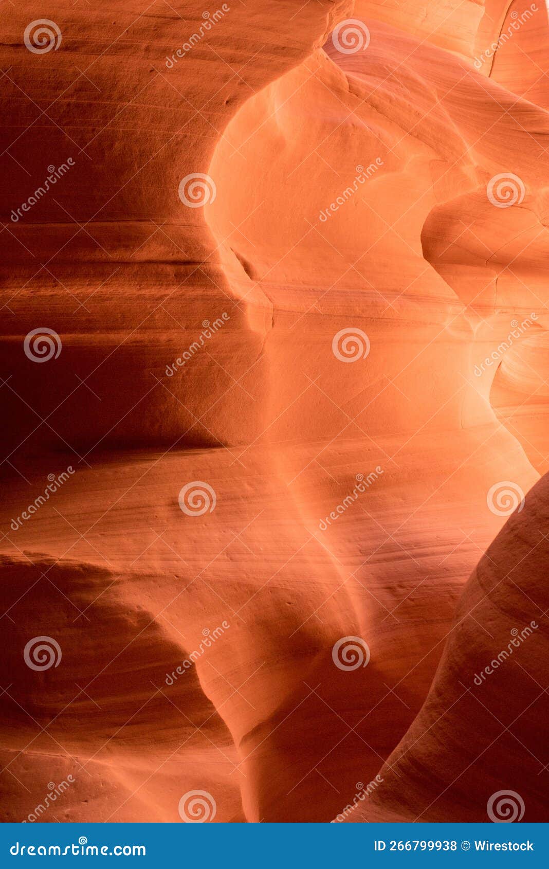 Vertical Shot of a Red Cave Illuminated by Bright Sunlight Stock Photo ...