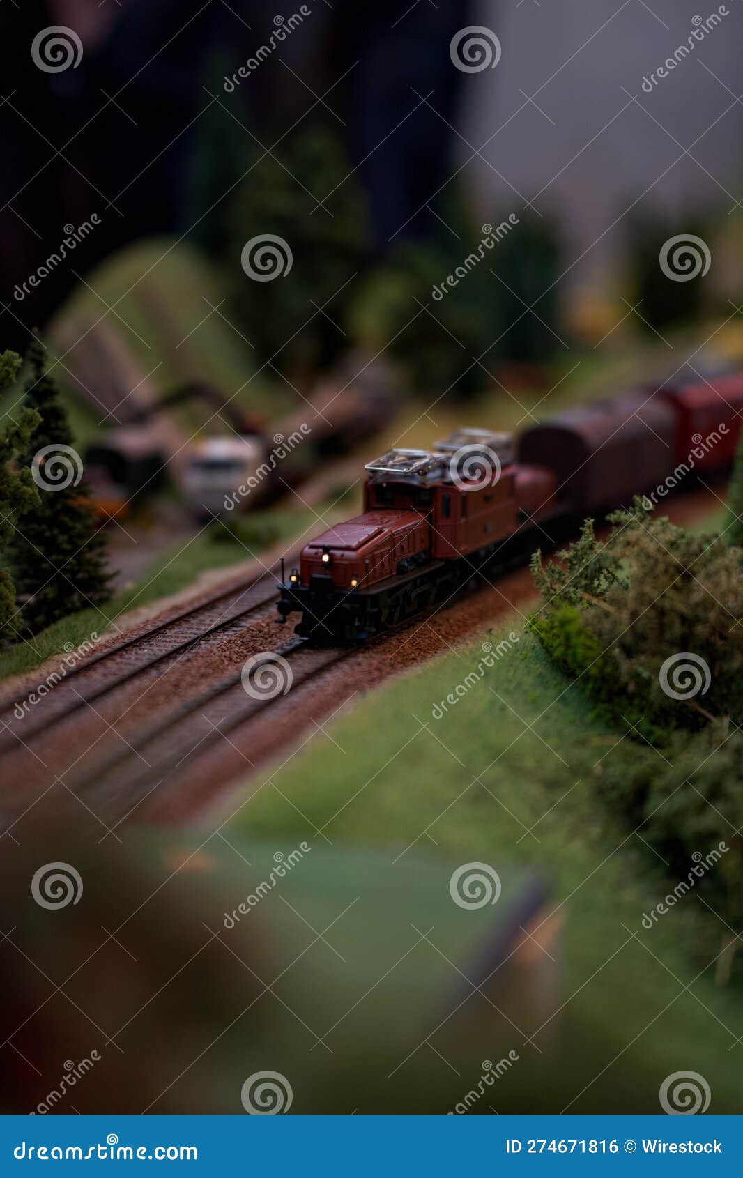 Vertical Shot of a Red Train Figure on Play Tracks Stock Photo - Image ...