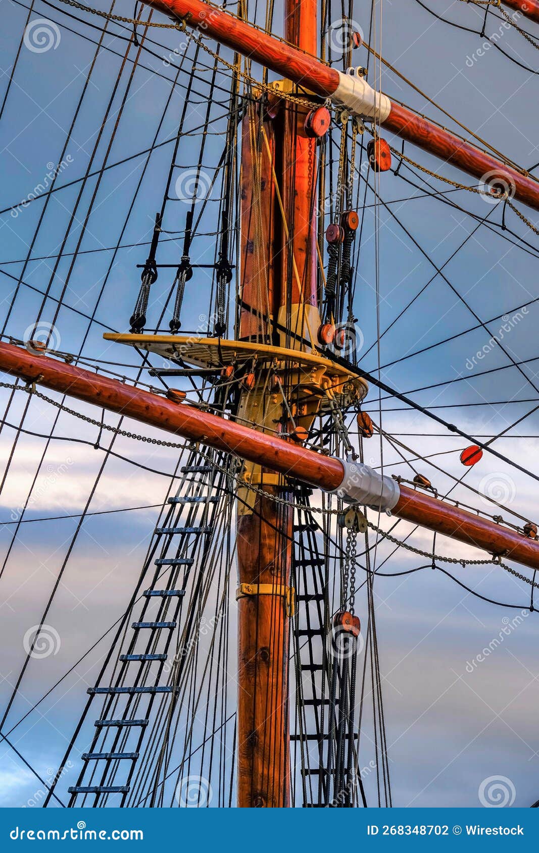 Vertical Shot of the Rigging and Mast of a Sailing Ship Under a Cloudy ...