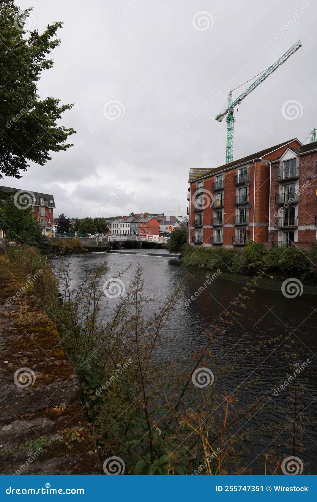 Vertical Shot of Riverside Buildings Under Construction Stock Image ...