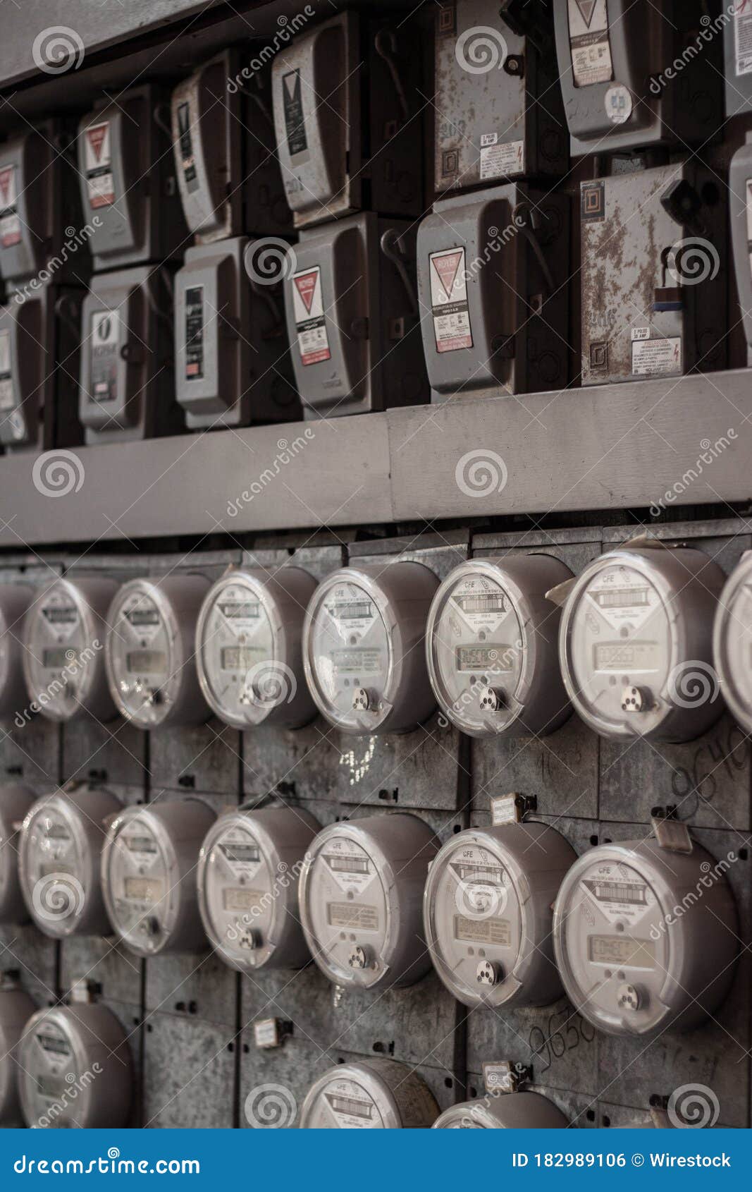 Vertical Shot of a Row of Electricity Meters Stock Photo - Image of ...