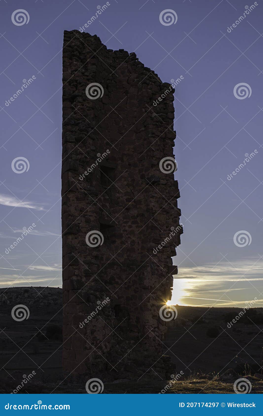 Vertical Shot of the Ruins of an Ancient Castle on the Sunset ...