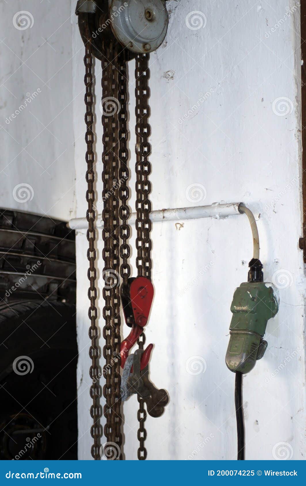 Vertical Shot of the Rusty Cable Chain Hoist of a Crane Stock Image ...