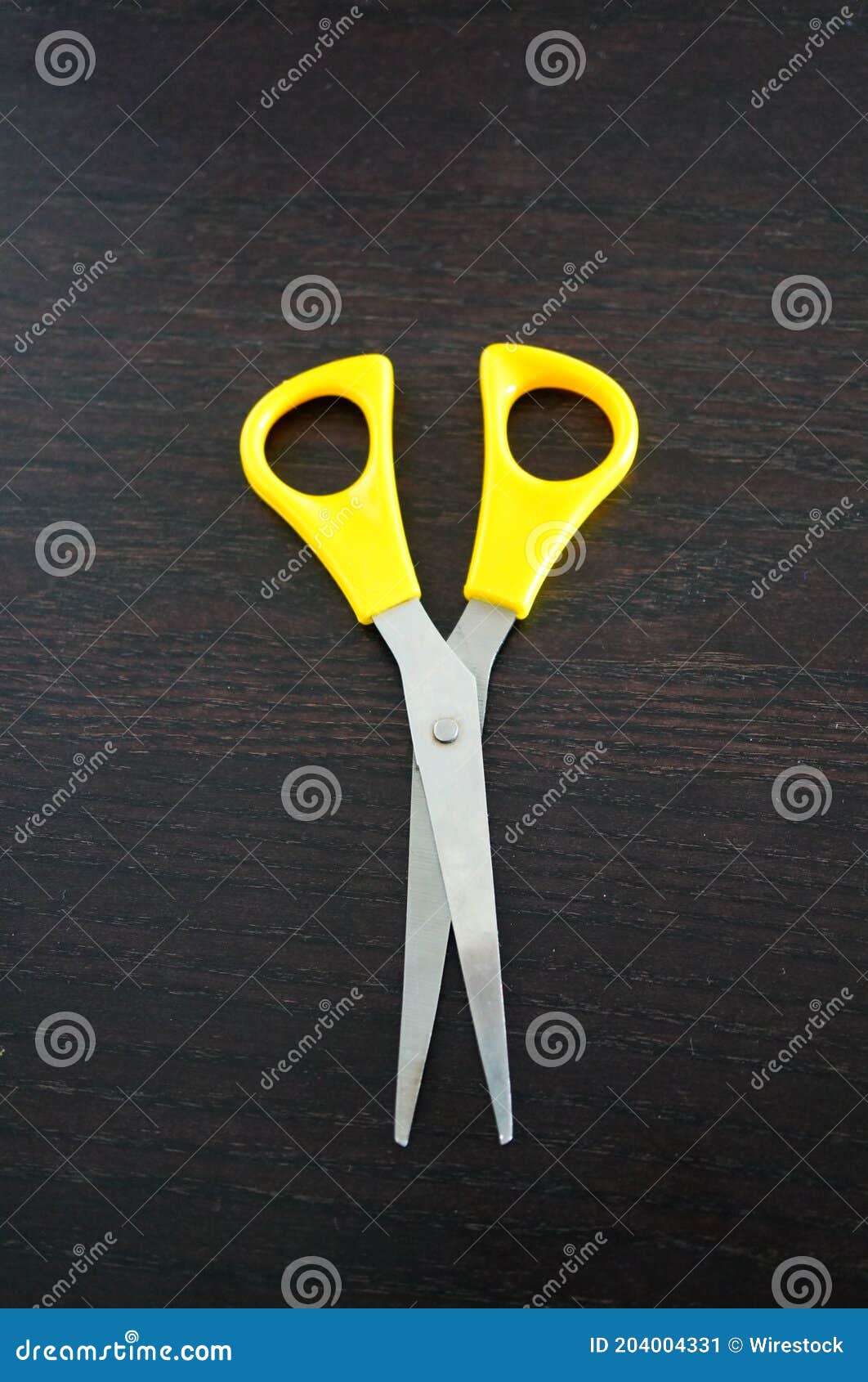 Vertical Shot of Scissors with Yellow Handles Stock Image - Image of ...