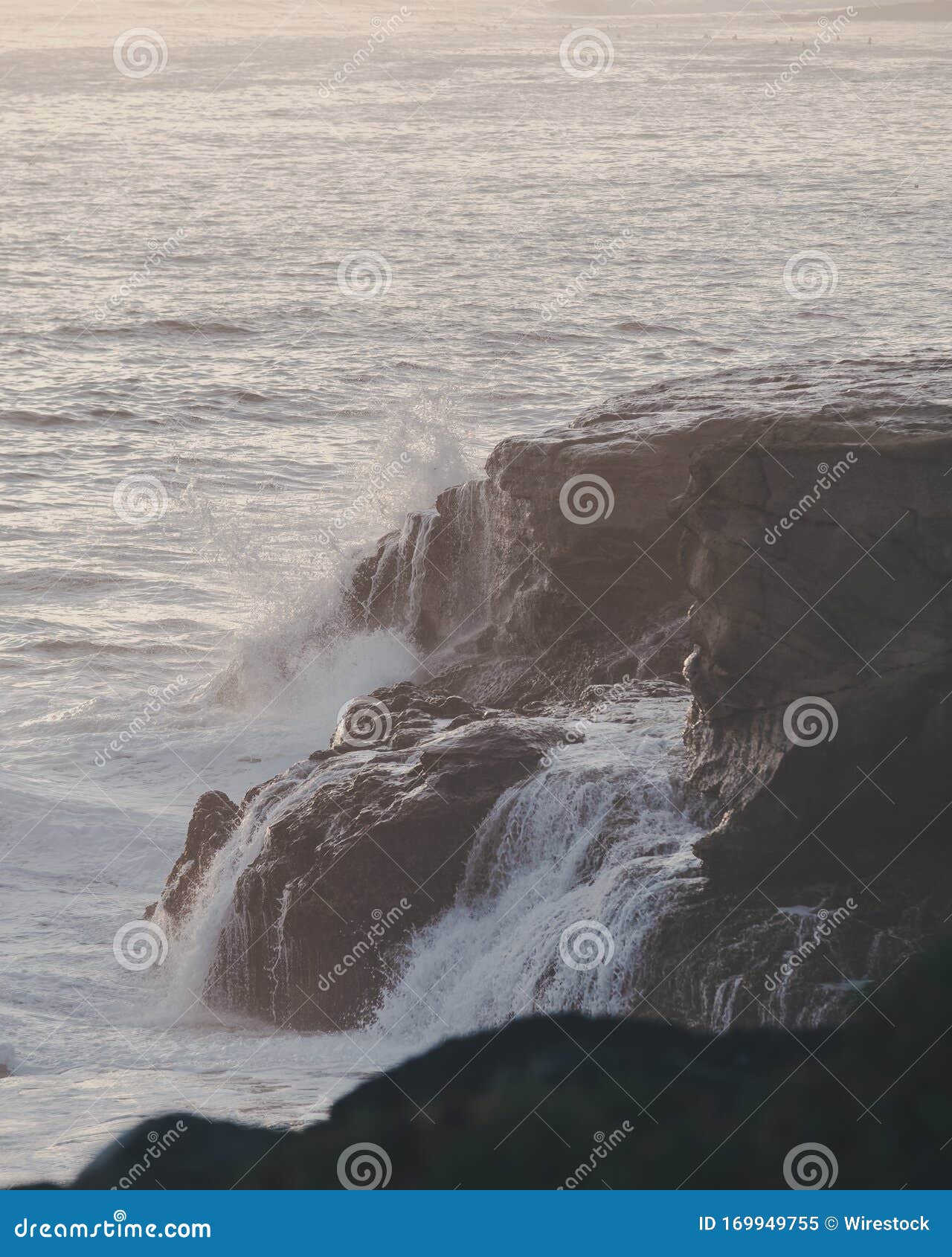 Vertical Shot of Sea Waves Hitting the Cliff Stock Image - Image of ...