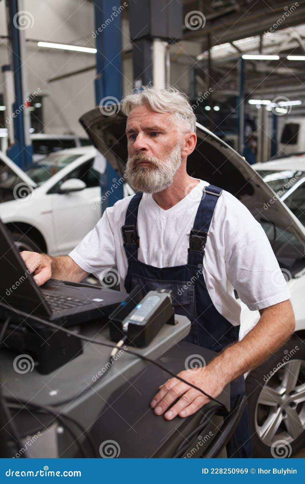 Elderly Repairman Working on a Car Stock Image - Image of mechanic ... Elderly Repairman Working on a Car Stock Image - Image of mechanic ...