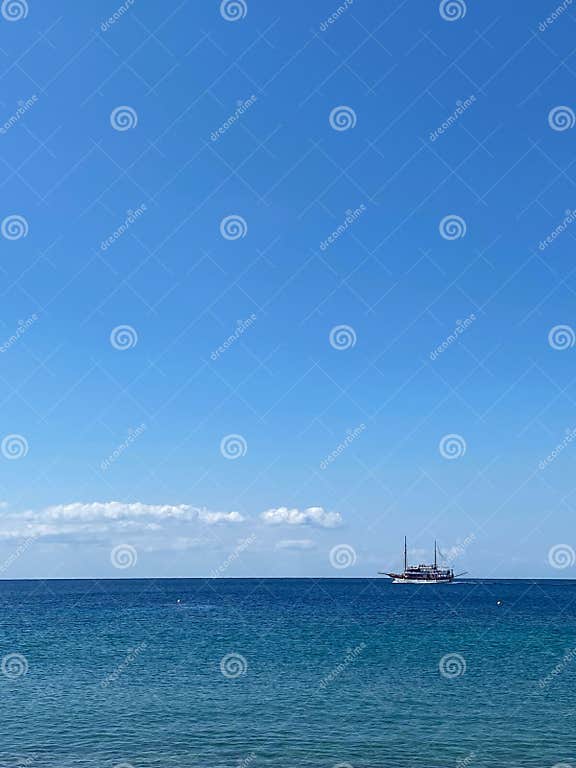 Vertical Shot of a Ship in the Sea Stock Image - Image of ship, vessel ...