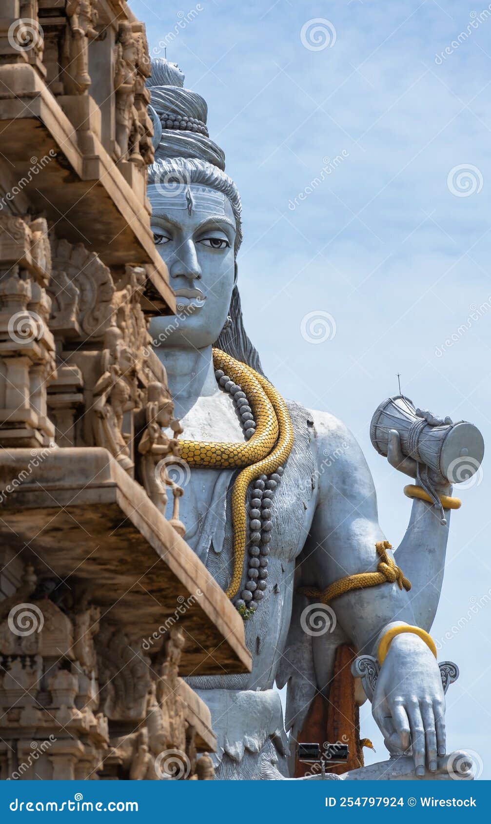 Vertical Shot of the Shiva Statue with a Sky Background Stock Photo ...