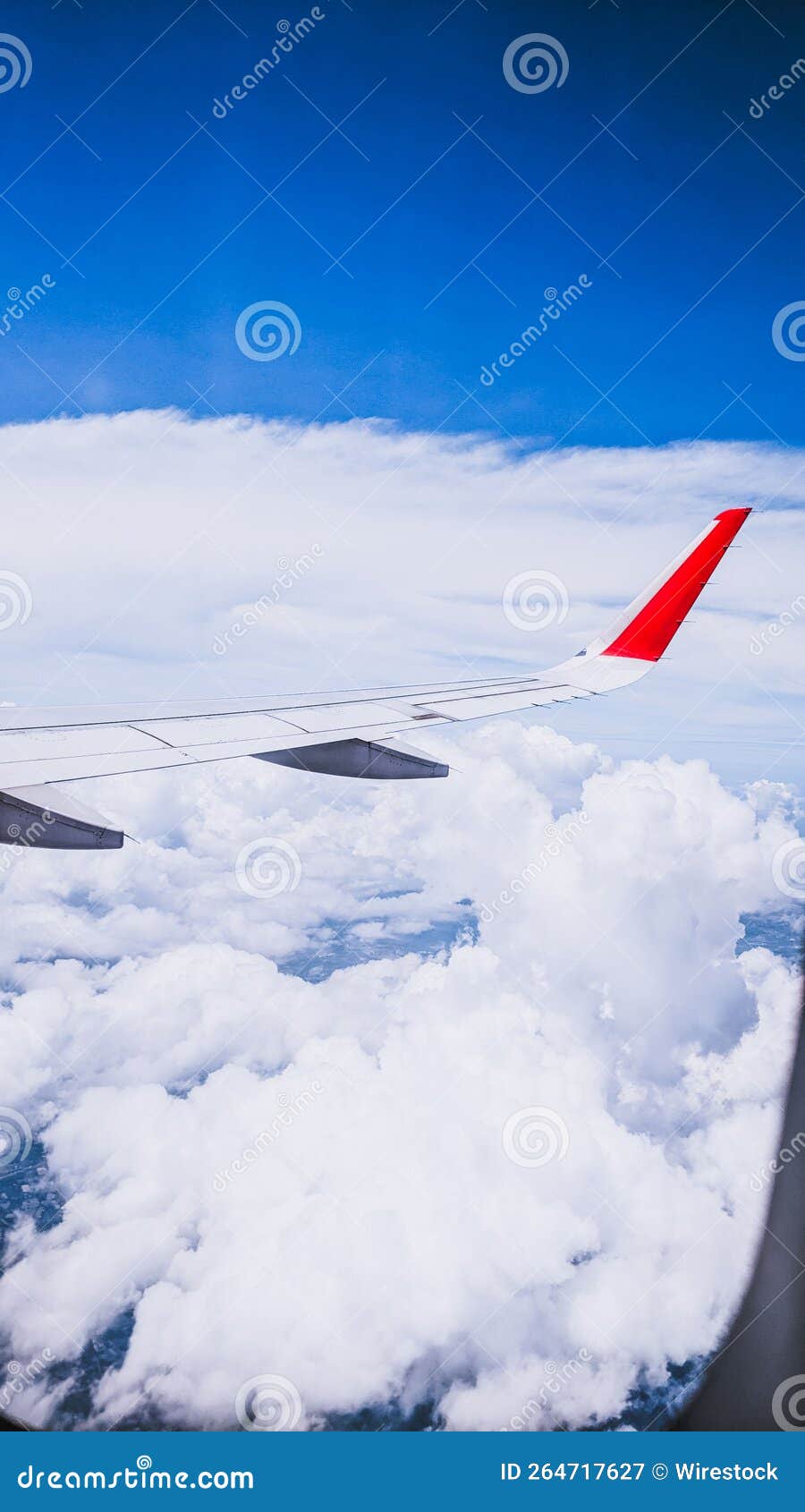Vertical Shot of the Sky and Plane S Wing through the Window. Stock ...