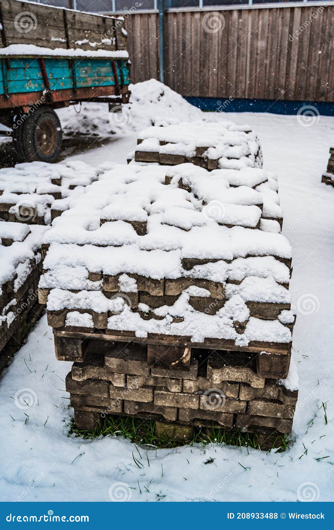 Vertical Shot of a Snow-covered Stack of Paving Stones Stock Photo ...