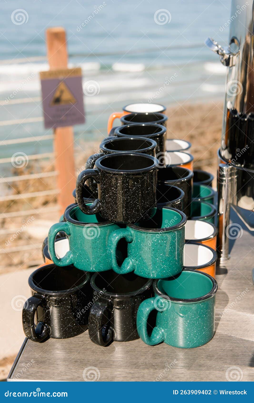 Vertical Shot of a Stack of Handmade Clay Cups at a Store Stock Photo ...