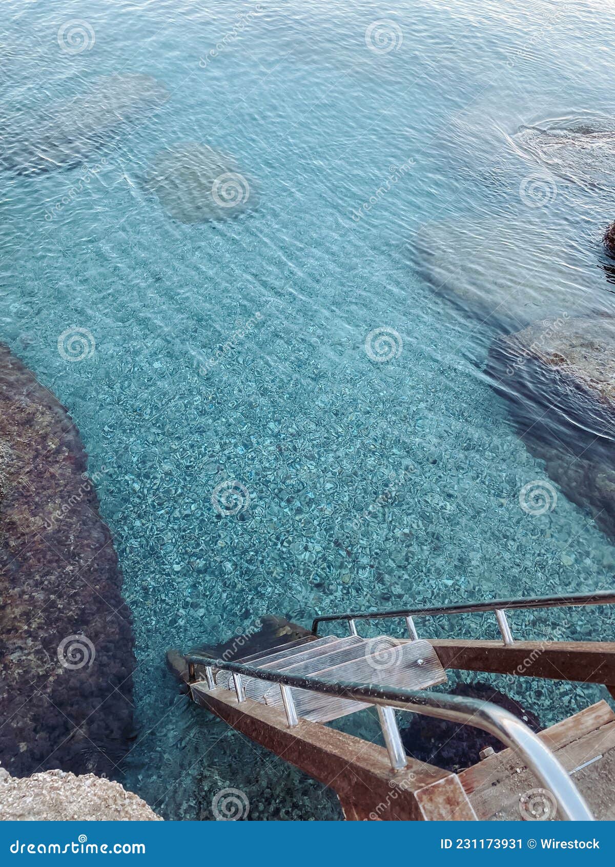 Vertical Shot of Stairs Leading into the Sea Stock Image - Image of ...