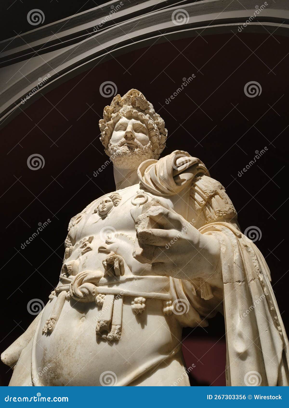 Vertical Shot of the Statue of a God in a Museum Stock Photo - Image of ...