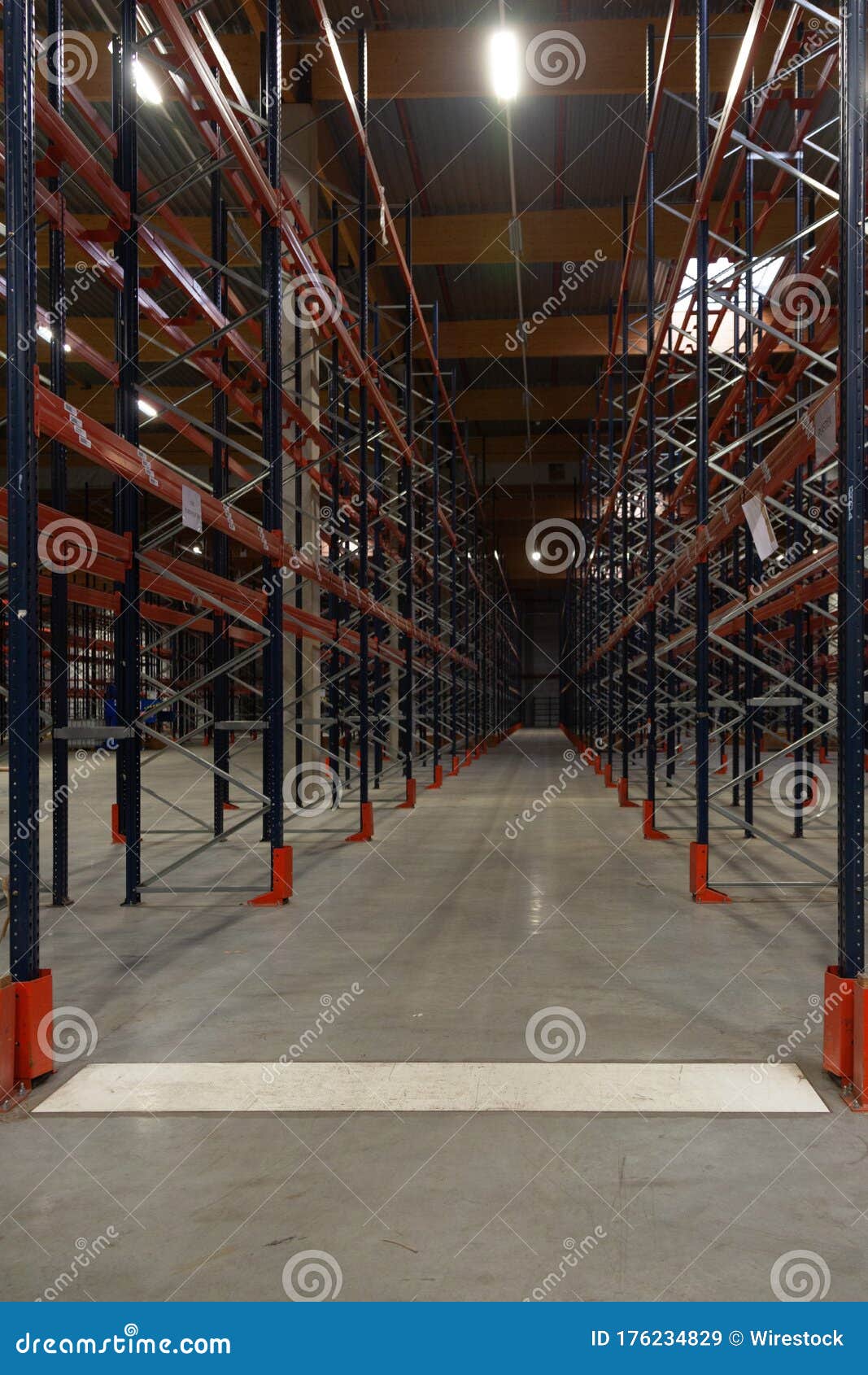Vertical Shot of Storage Racks in a Warehouse Stock Image - Image of ...