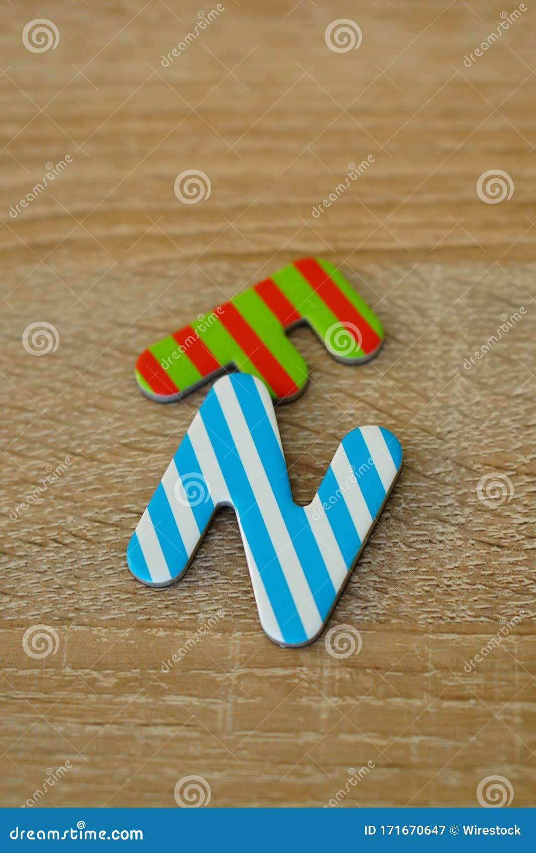 Vertical Shot of Striped Words on a Wooden Surface Stock Image - Image ...