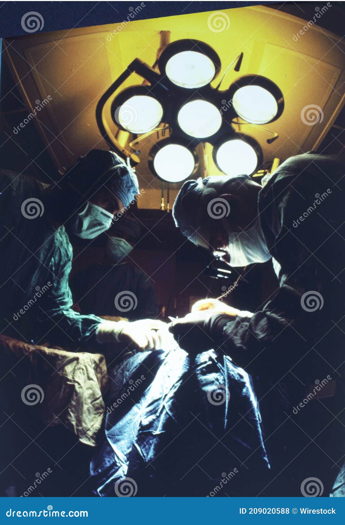 Vertical Shot of Surgeons during an Operation Stock Photo - Image of ...