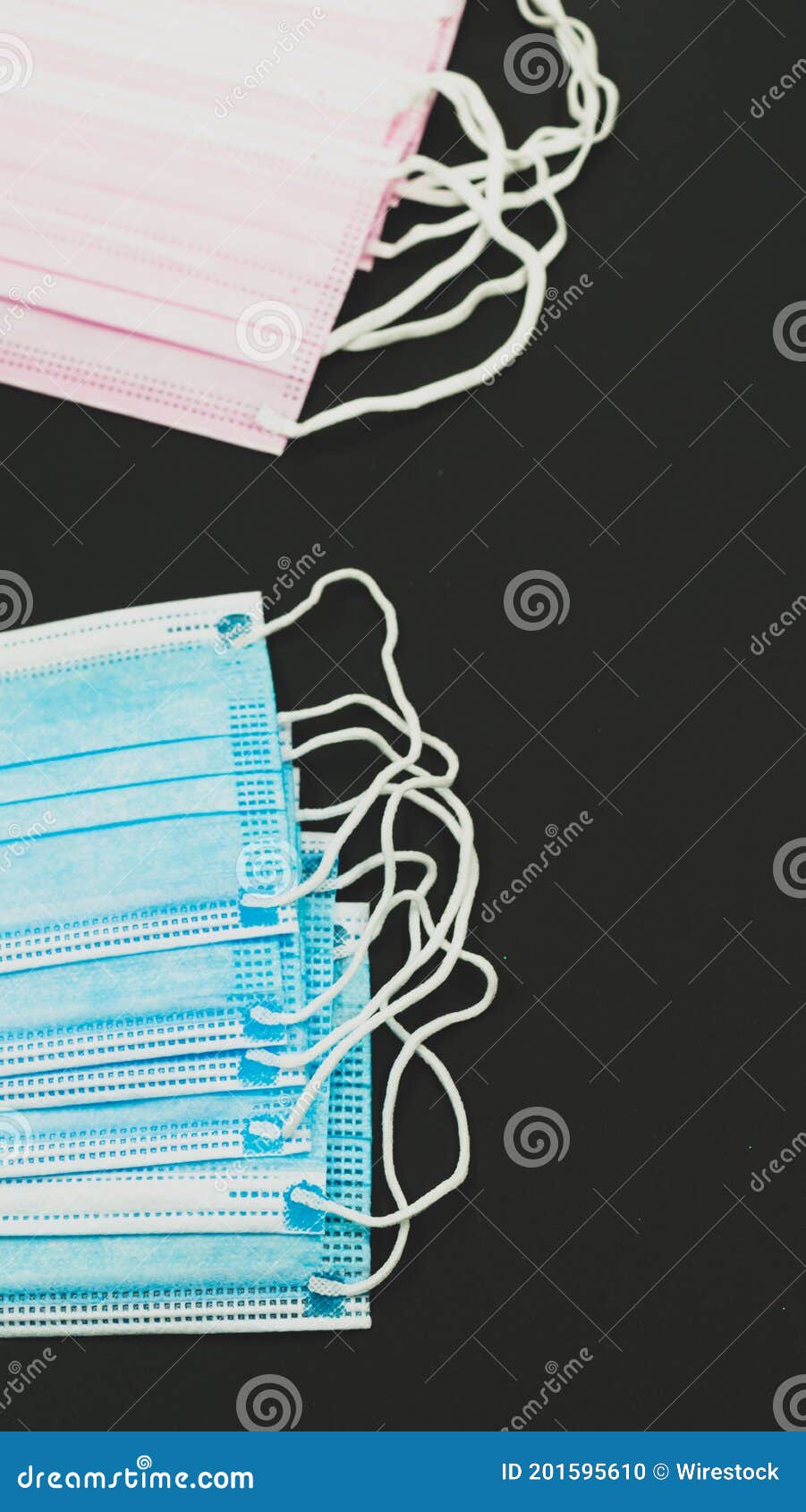 Vertical Shot of Surgical Masks on a Black Surface Stock Photo - Image ...
