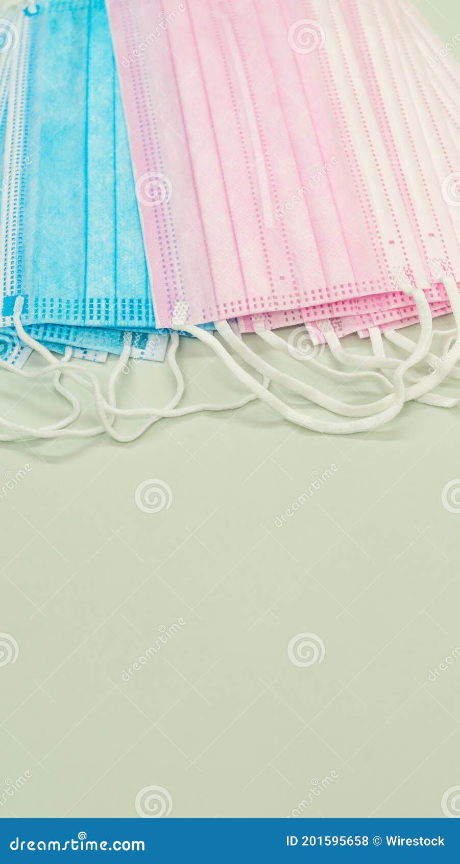 Vertical Shot of Surgical Masks on a White Surface Stock Photo - Image ...