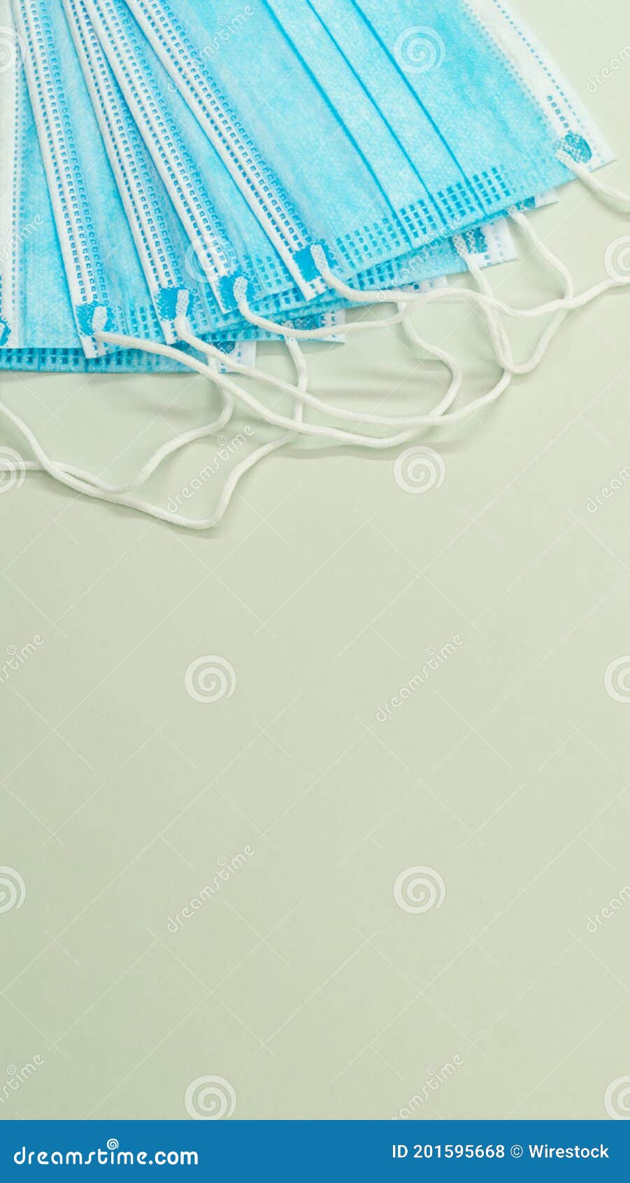 Vertical Shot of Surgical Masks on a White Surface Stock Photo - Image ...