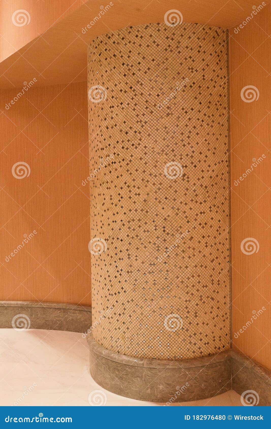 Vertical Shot of a Tiled Column on an Orange Wall in a Building Stock ...