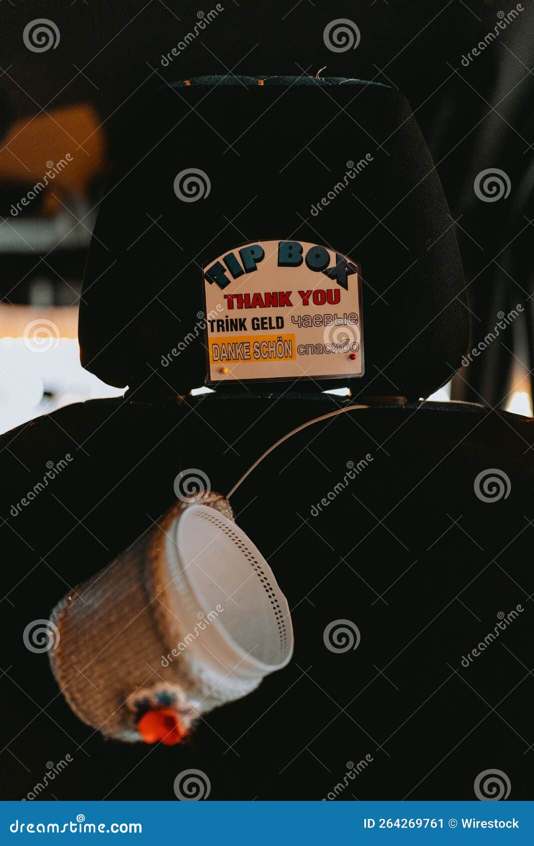 Vertical Shot of Tip Cup on the Back Seat of a Cab Stock Image - Image ...