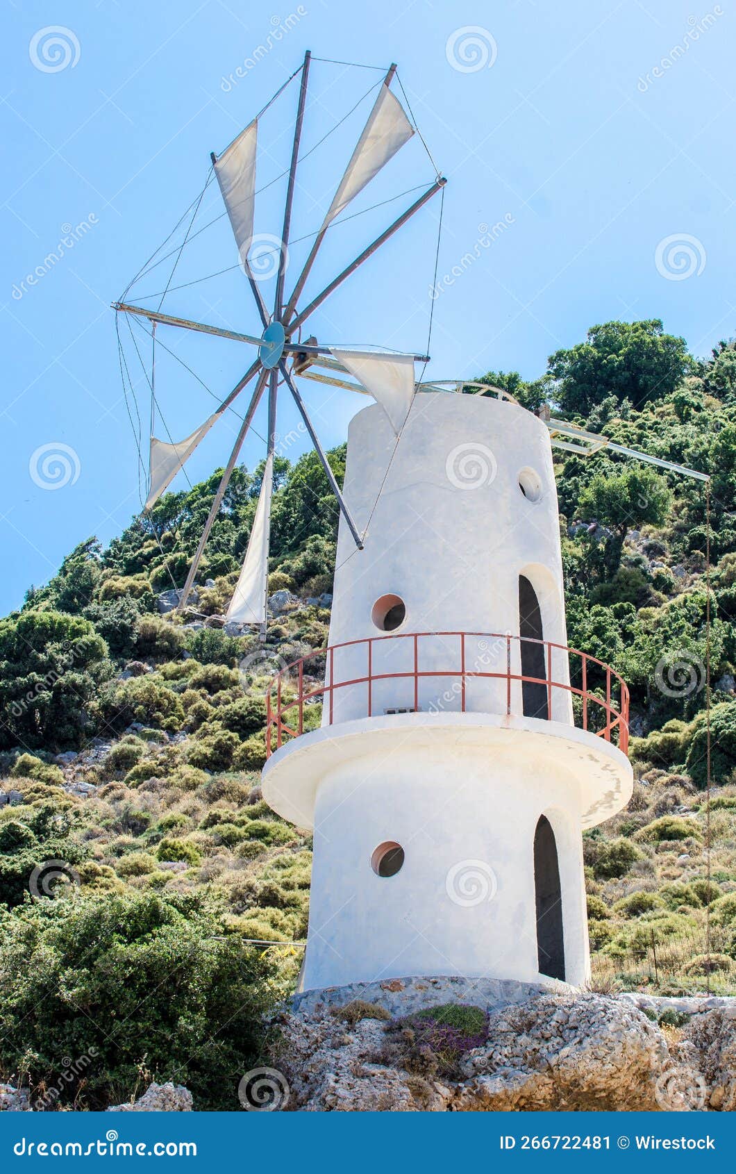 Vertical Shot of a Traditional Greek White Windmill. Stock Image ...